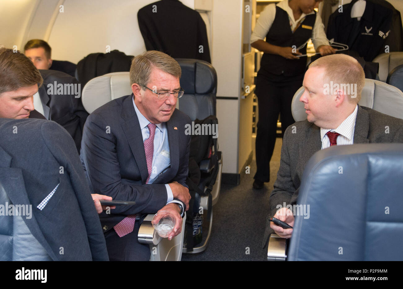 Defense Secretary, Ash Carter, speaks to the media during a flight to ...