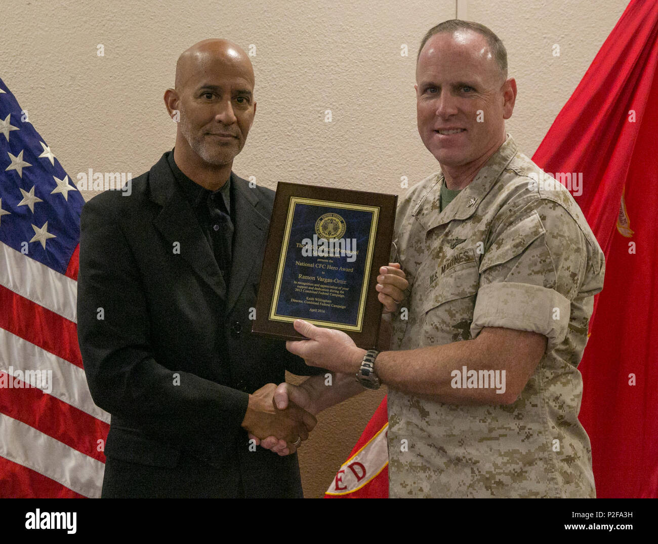 Col. James Harp, Combat Center Chief of Staff, presents the Combined ...