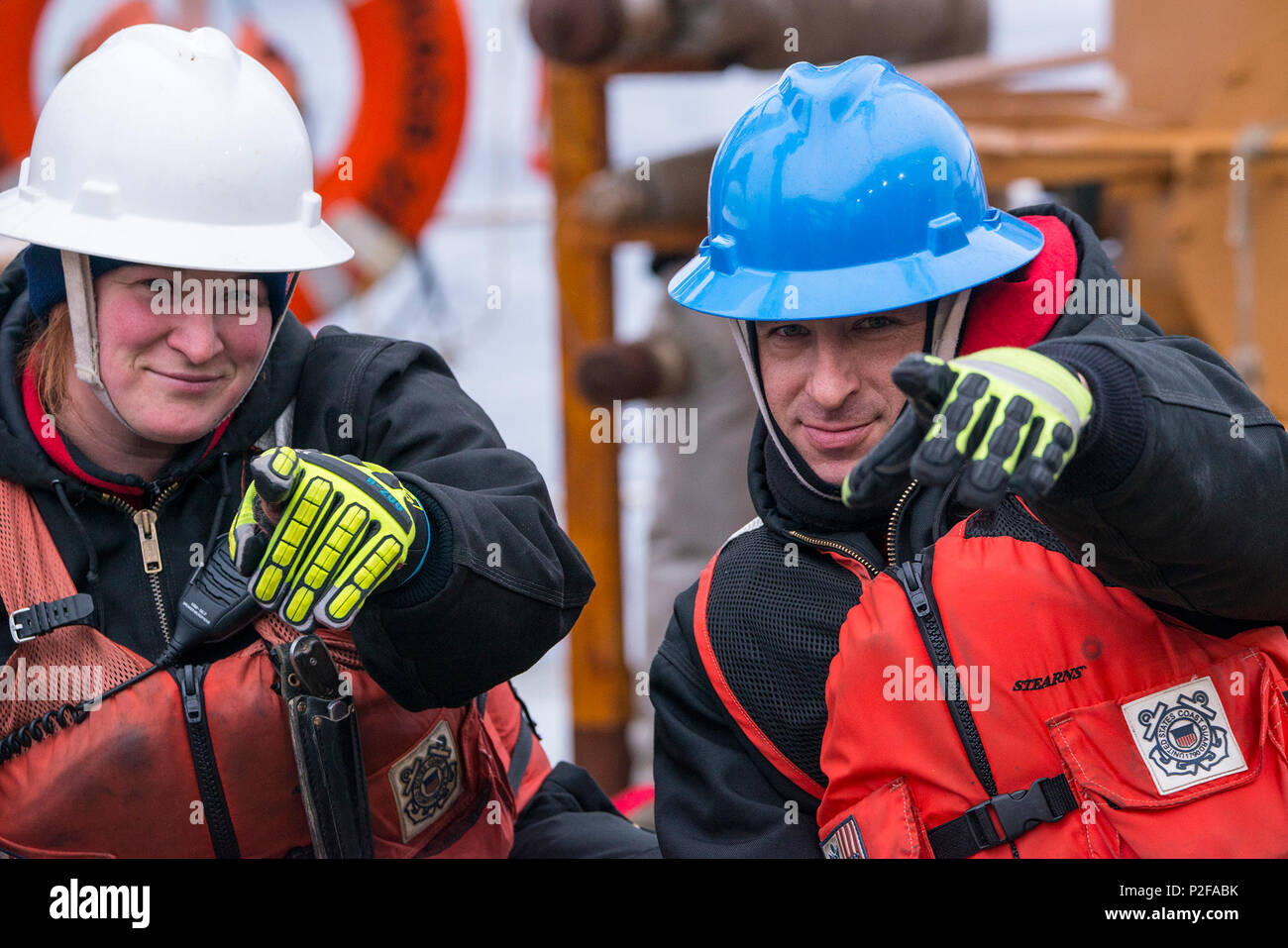 Petty Officer 2nd Class Julia Kinney and Petty Officer 1st Class David ...