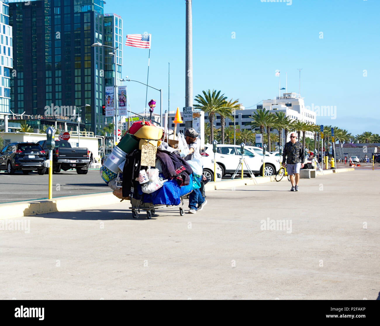 Homeless man pushing shopping cart hi-res stock photography and images ...