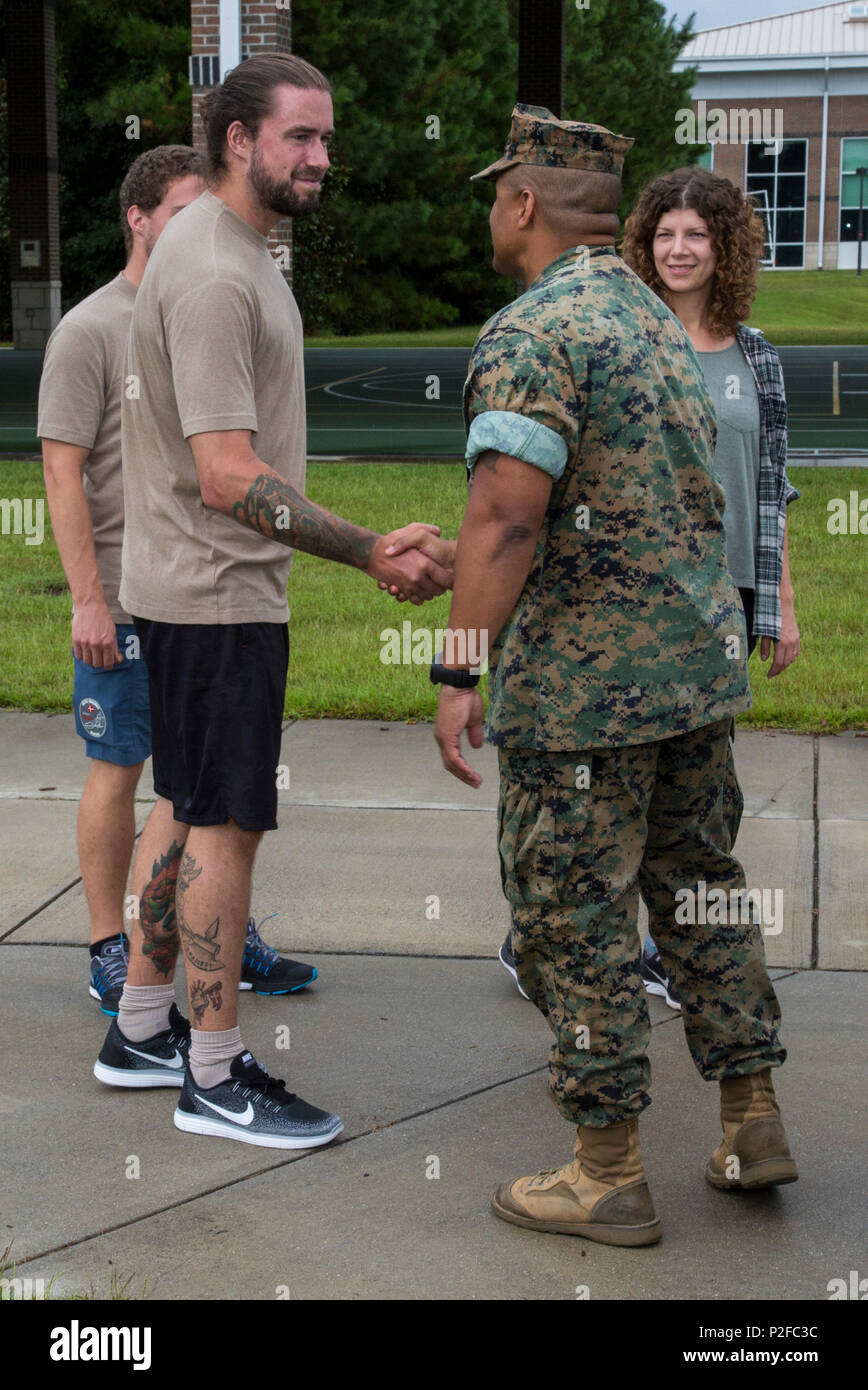 U.S. Marine Corps Sgt. Maj. Edward Parsons, right, sergeant major ...