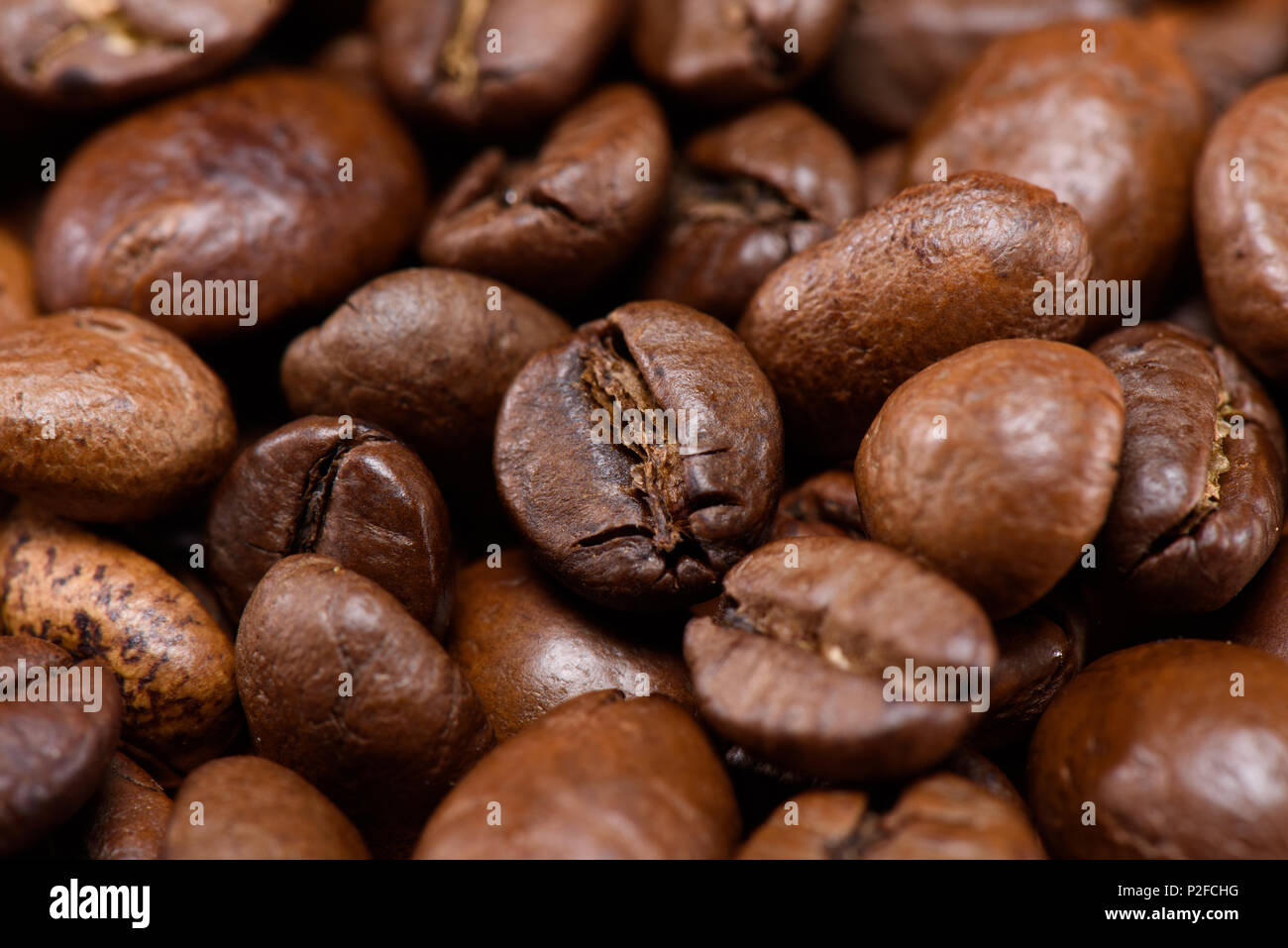 full frame of roasted coffee beans backdrop Stock Photo - Alamy