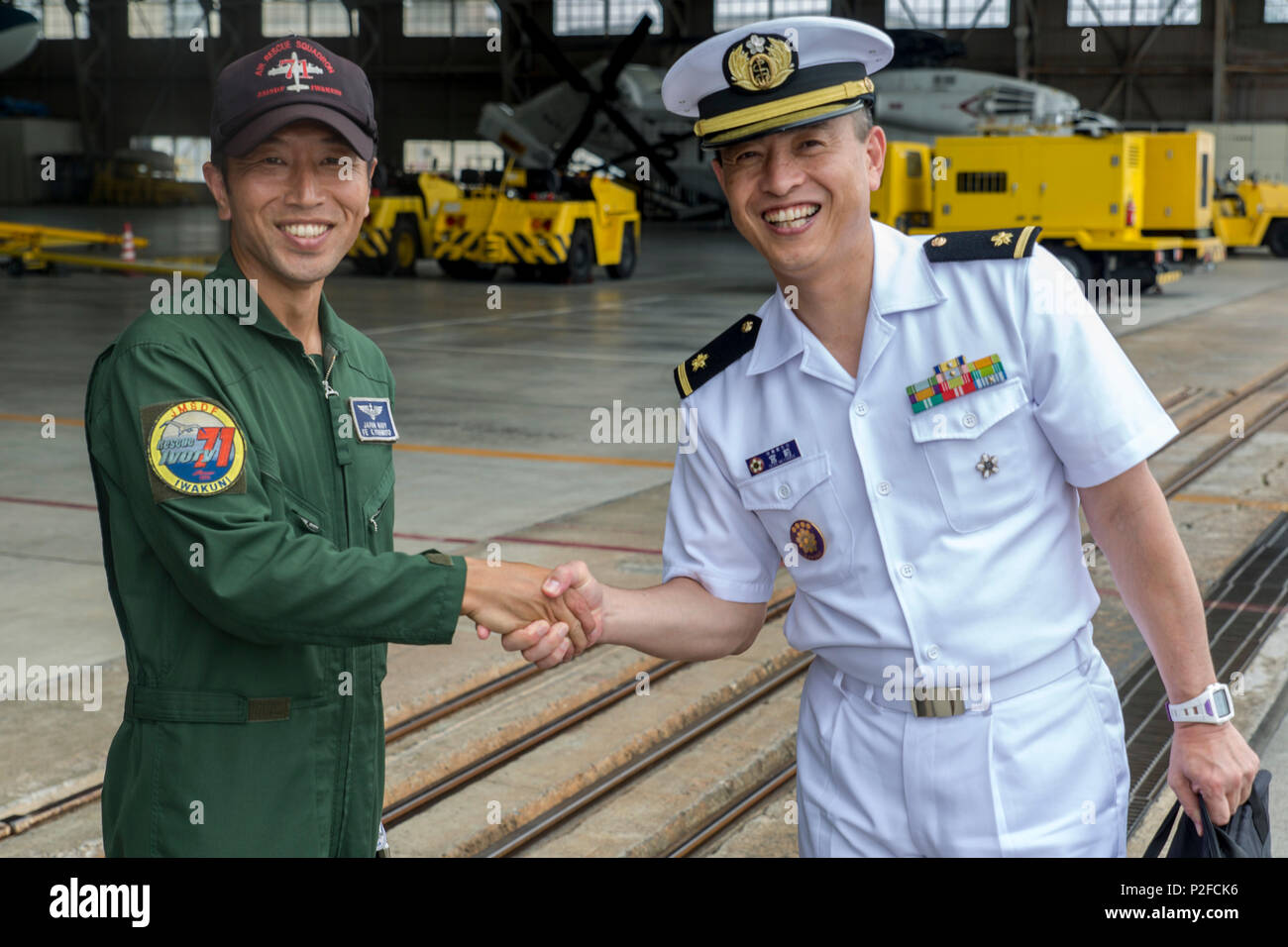 A member of the Japan Maritime Self-Defense Force (JMSDF), Air Rescue ...
