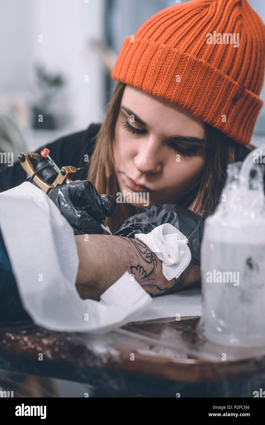 Tattooing process hi-res stock photography and images - Alamy