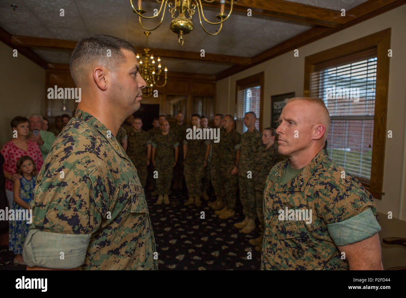 U.S. Marine Corps Maj. Eric Montalvo, left, staff judge advocate, and ...