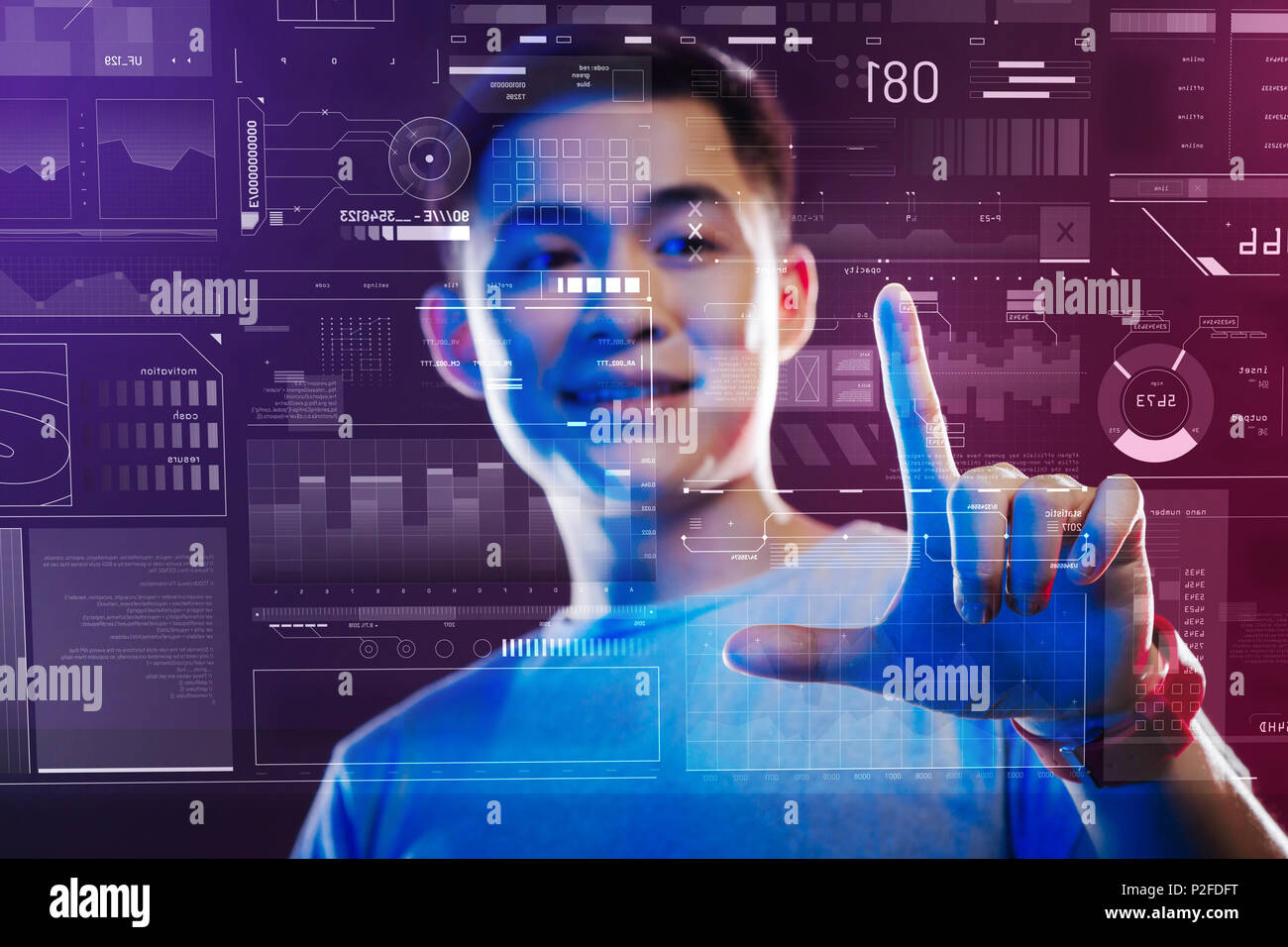Positive IT man using touch screen Stock Photo - Alamy