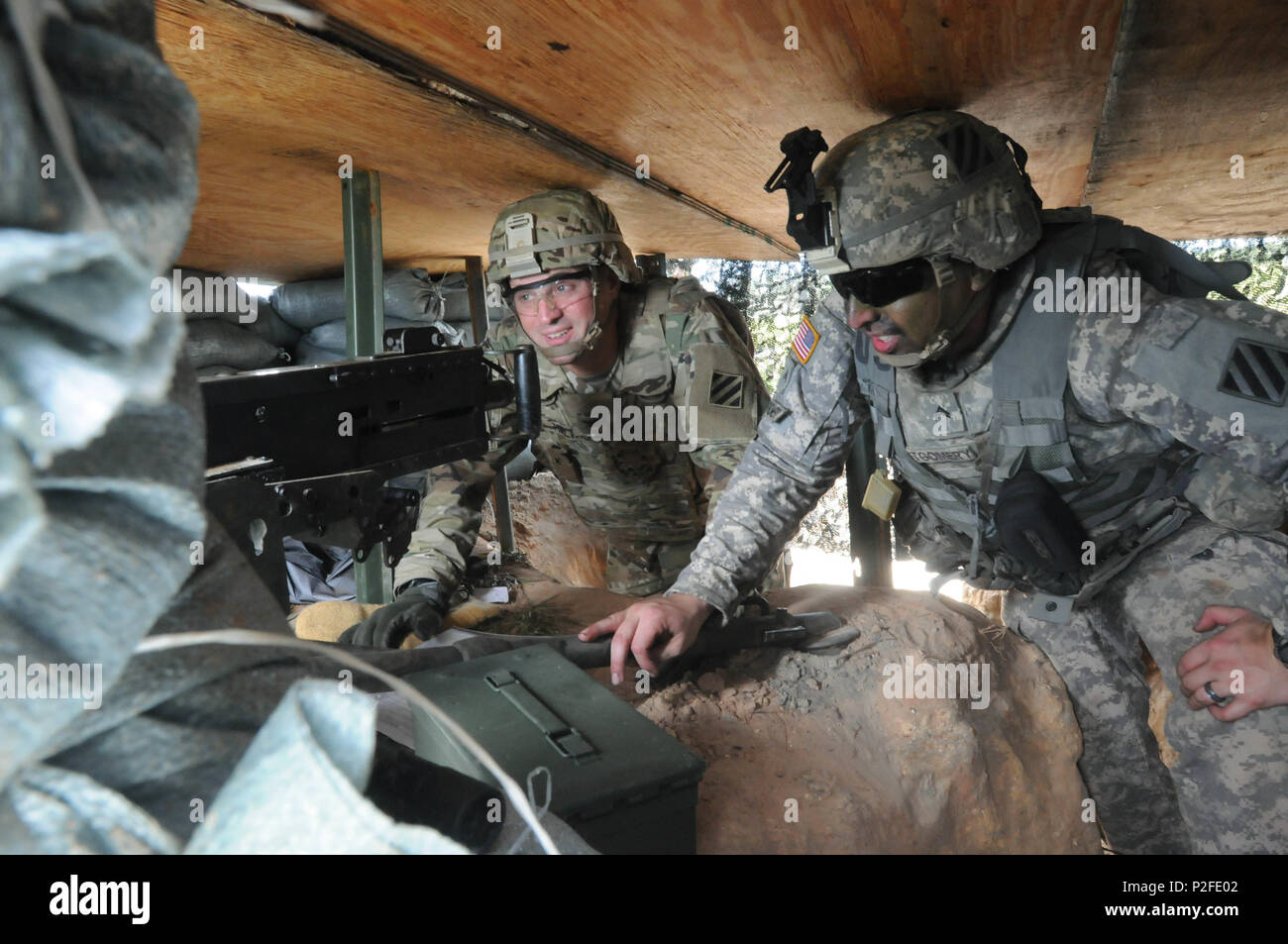 Cpl. Cody Montgomery (right), a supply specialist with Headquarters and ...