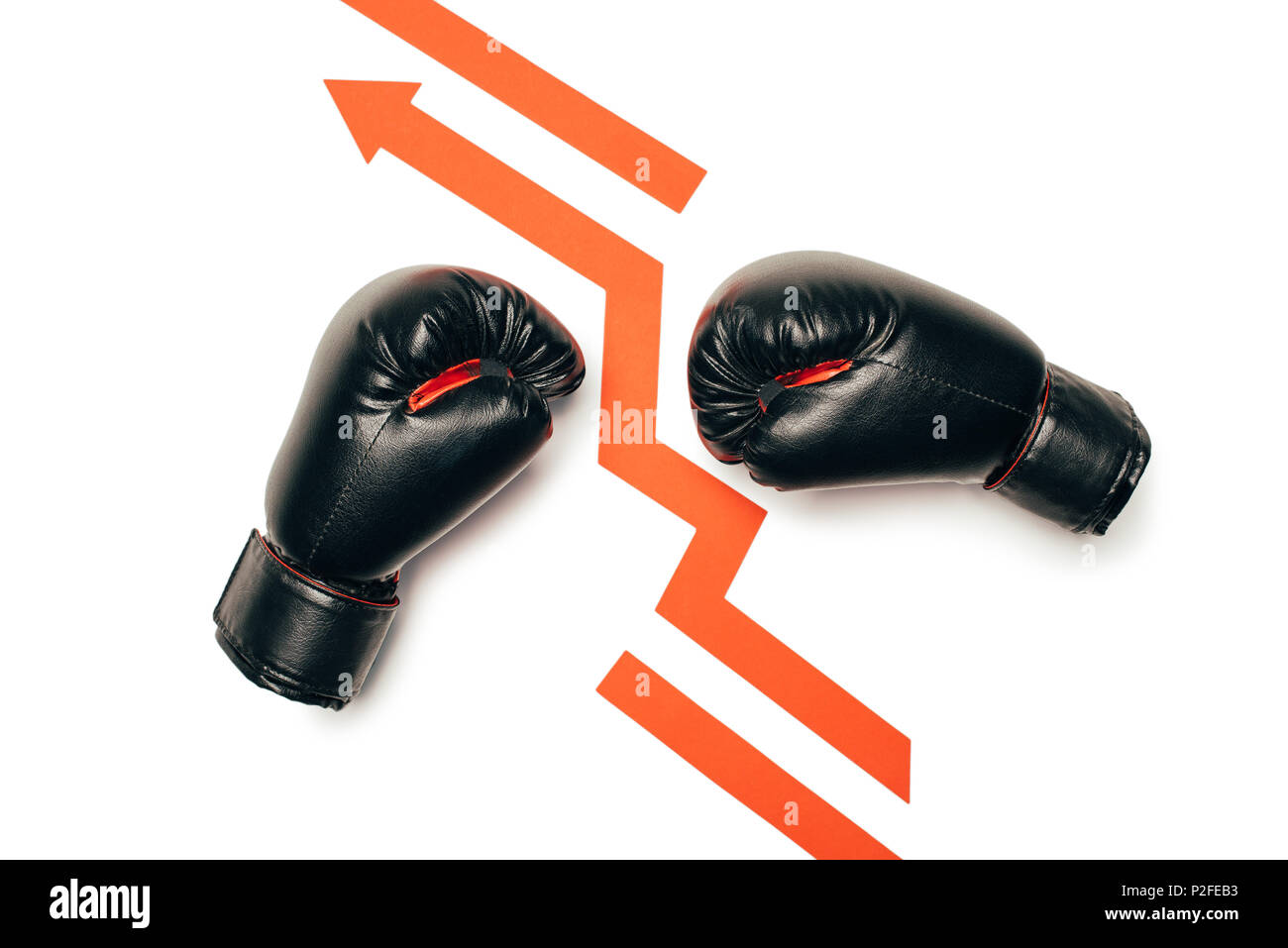 Black boxing gloves separated with arrow sign and ready to fight ...