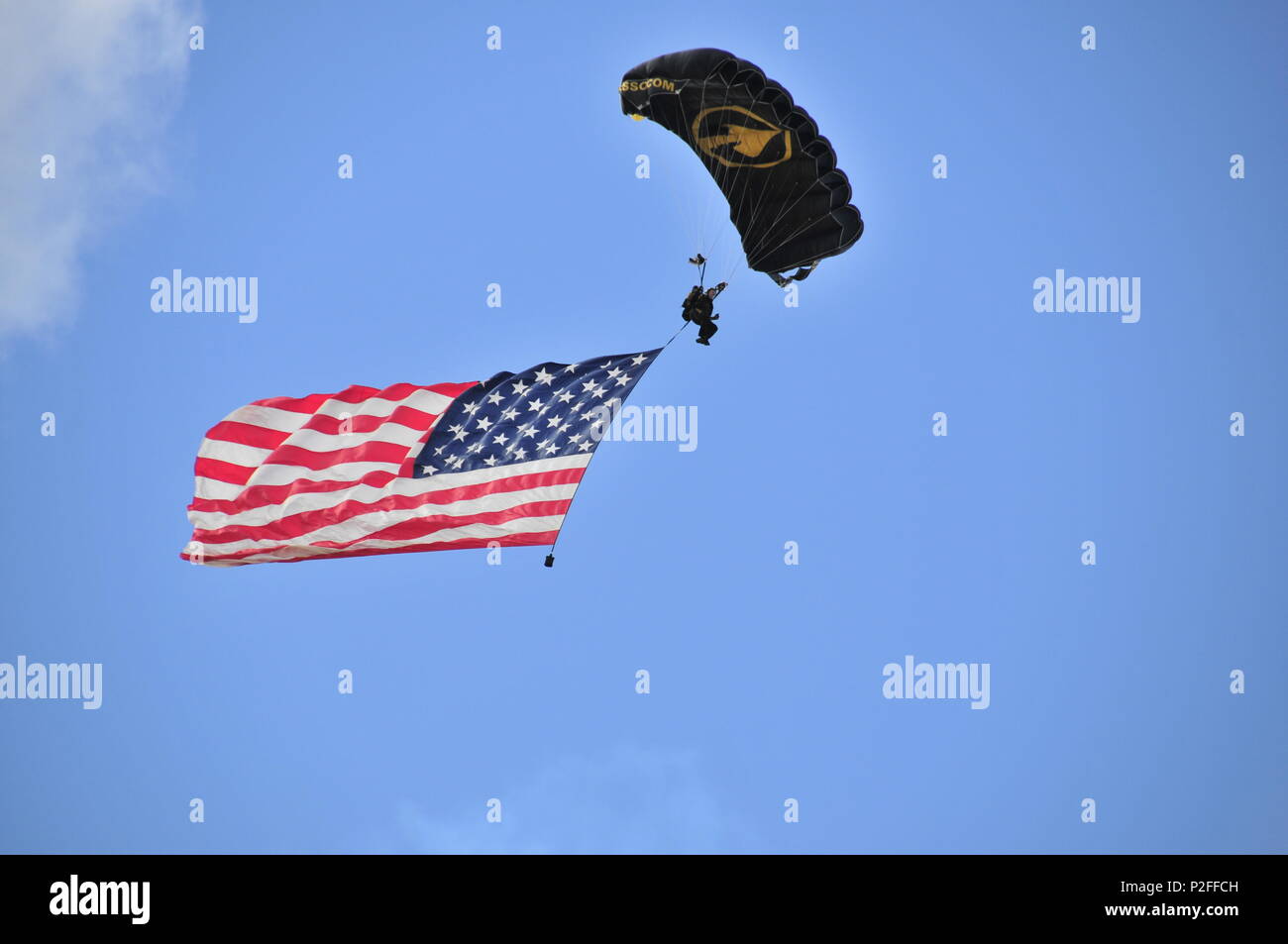 A United States Special Operations paratrooper descends from the sky ...