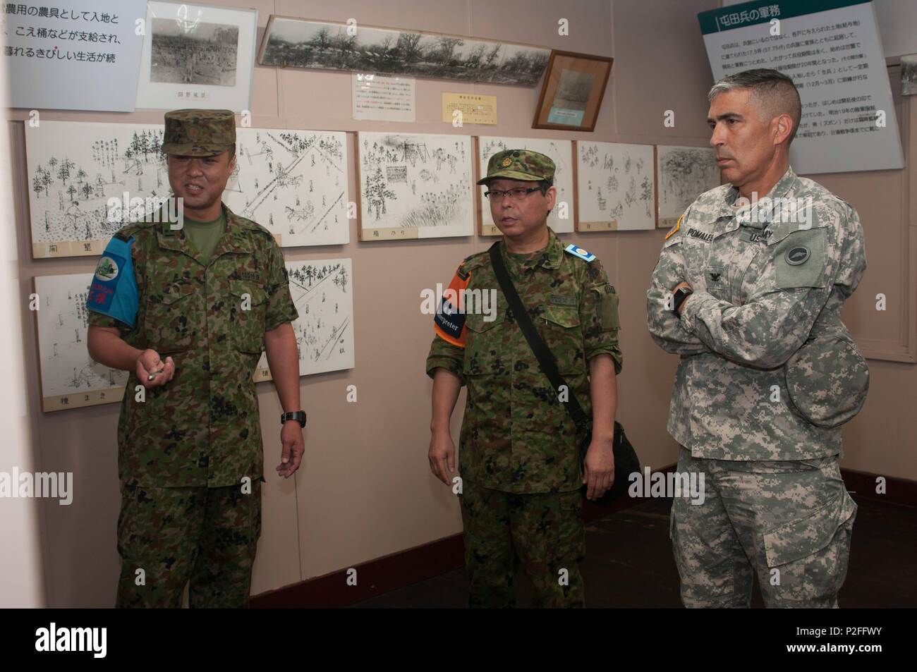 Japan Ground Self-Defense Force 1st Lt. Naohito Takemata (left), public ...