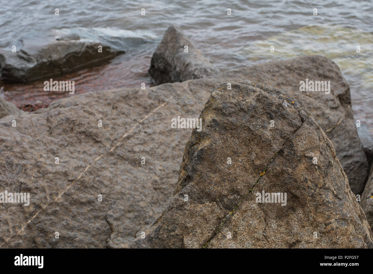 Large smooth rocks on beach hi-res stock photography and images - Alamy