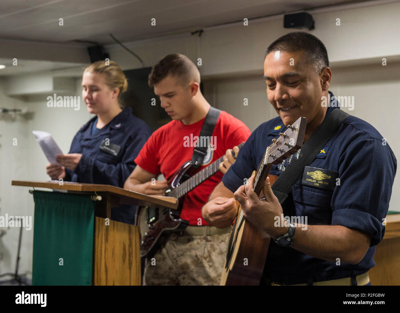 PACIFIC OCEAN (September 18, 2016) – From right, Lt. Cmdr. Aaron ...