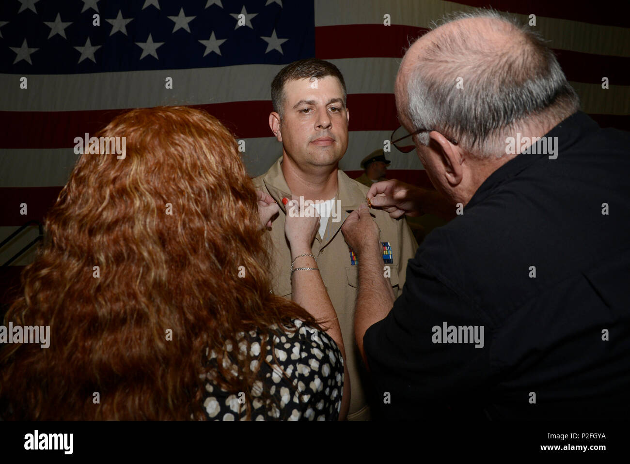 MAYPORT, Fla. (Sept. 16, 2016) – Chief Damage Controlman Benjamin Lieb is pinned by his family ...