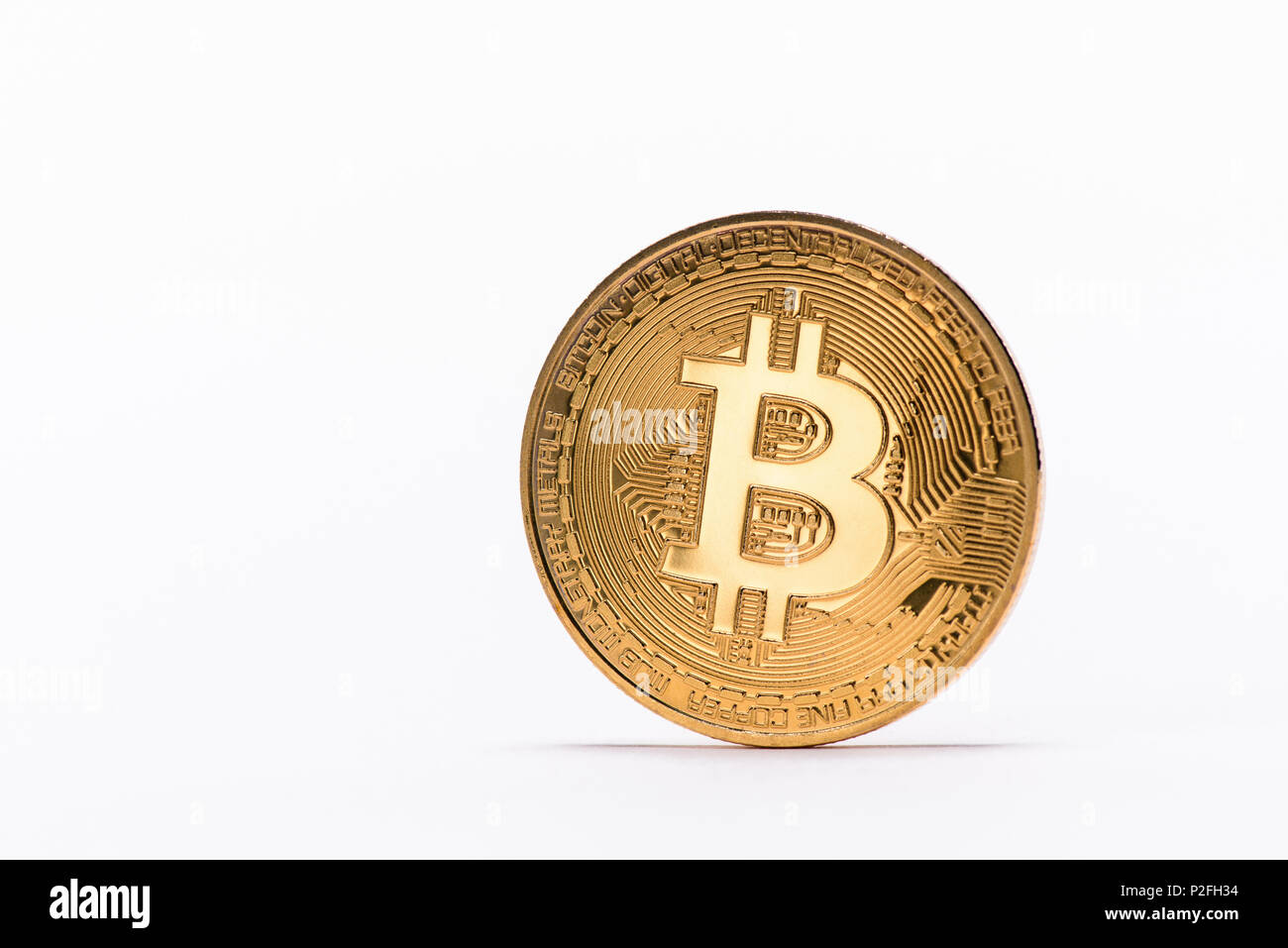 close up view of golden git coin isolated on white Stock Photo - Alamy