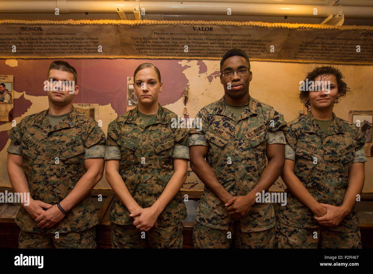The 3rd Marine Division reproductions team poses in front of the 3rd ...