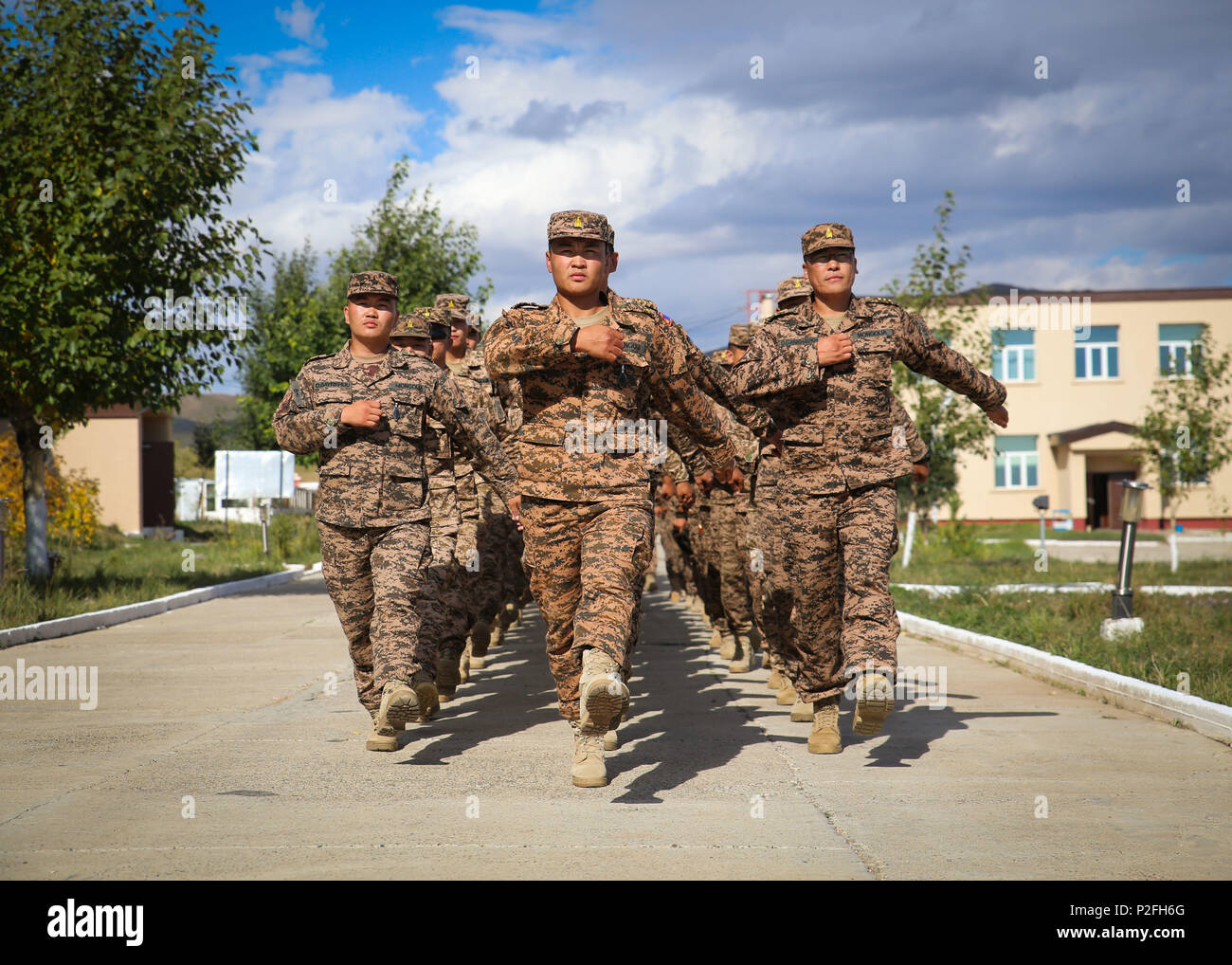 Mongolian Armed Forces soldiers march to another location during Non ...