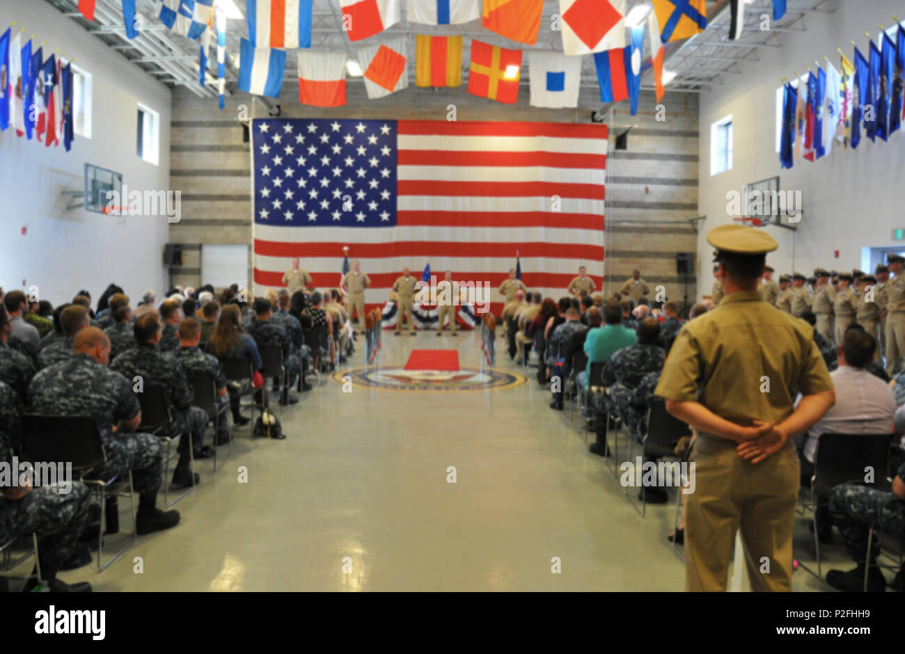 AURORA, Colo. (Sept. 16, 2016) Family members and shipmates observe as ...