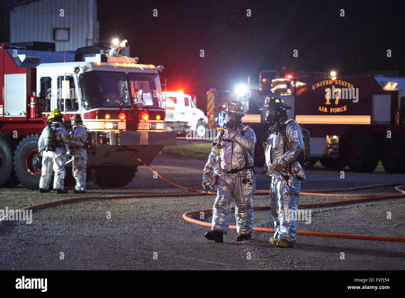 788th Civil Engineer Squadron firefighters converse after putting out ...
