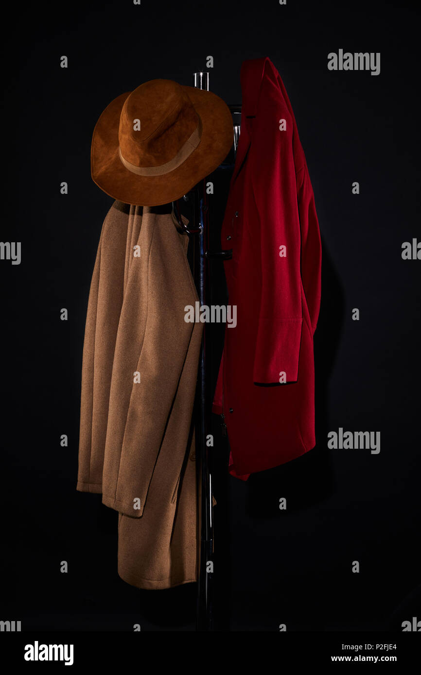 Coats hanging home hi-res stock photography and images - Alamy