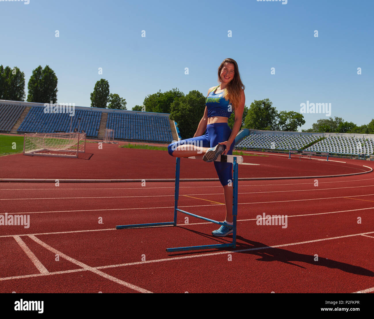 teenage girls doing sports at the stadium Stock Photo - Alamy