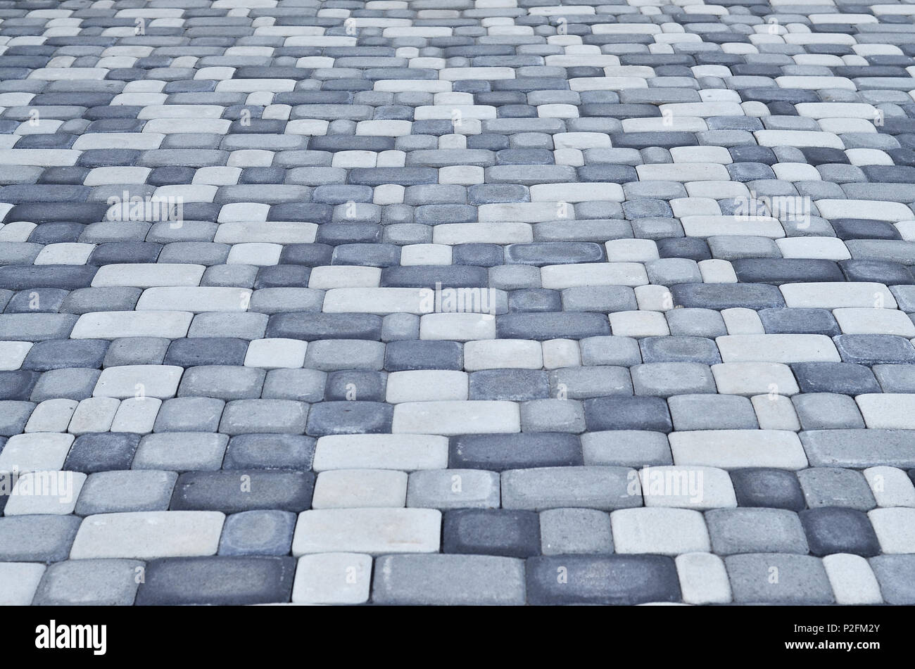 A detailed photo of the square, laid out of modern paving stone with ...