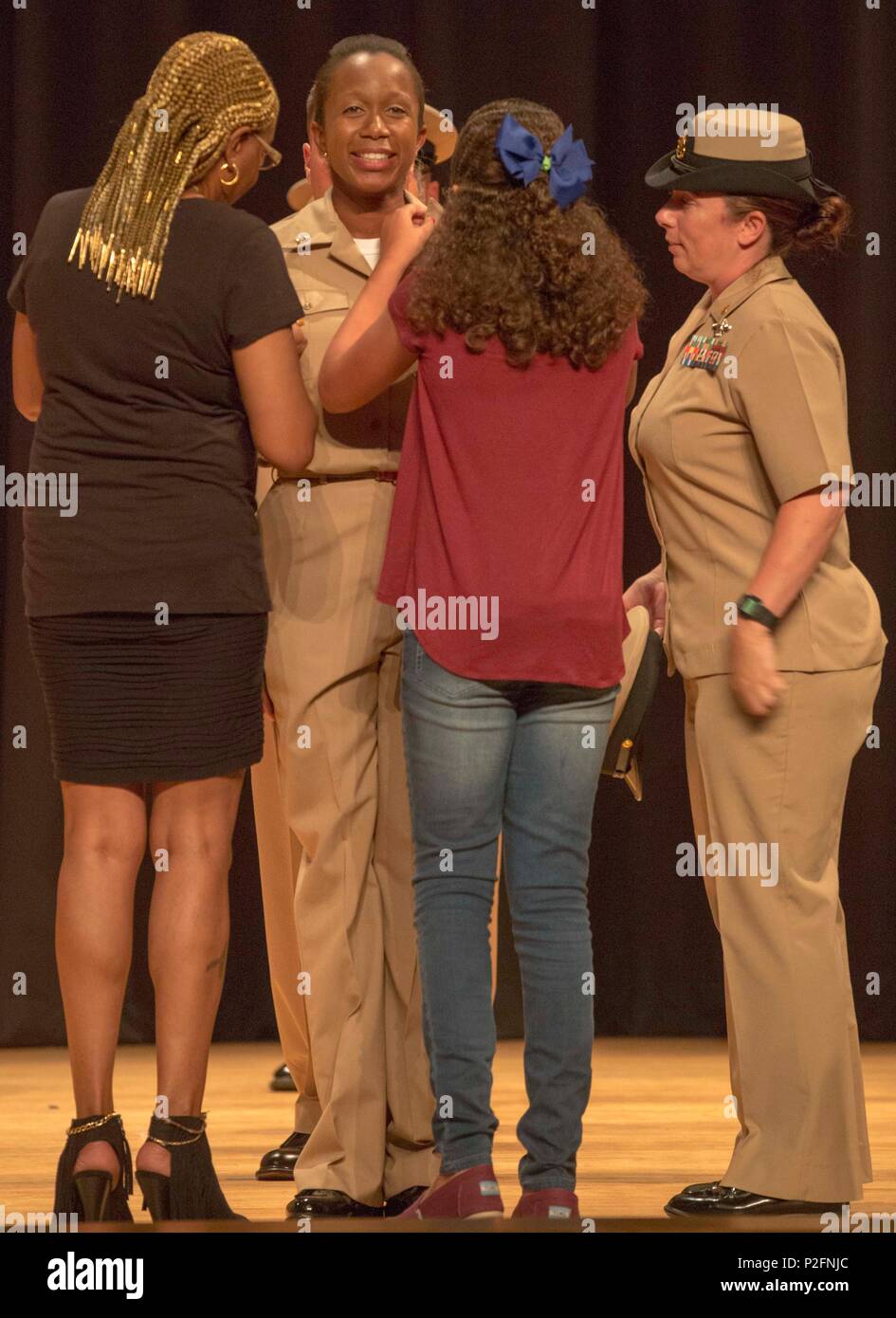 Chief Petty Officer Terry McCray-Matt, a newly Promoted Chief, gets ...
