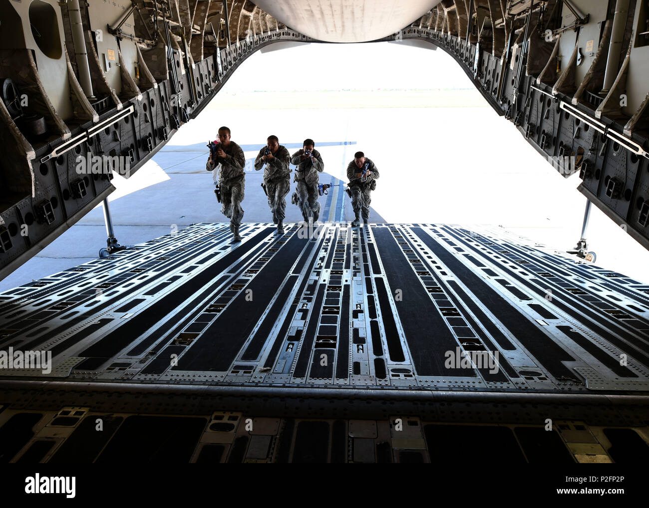 Members of the 97th Security Forces Squadron practice clearing a U.S ...