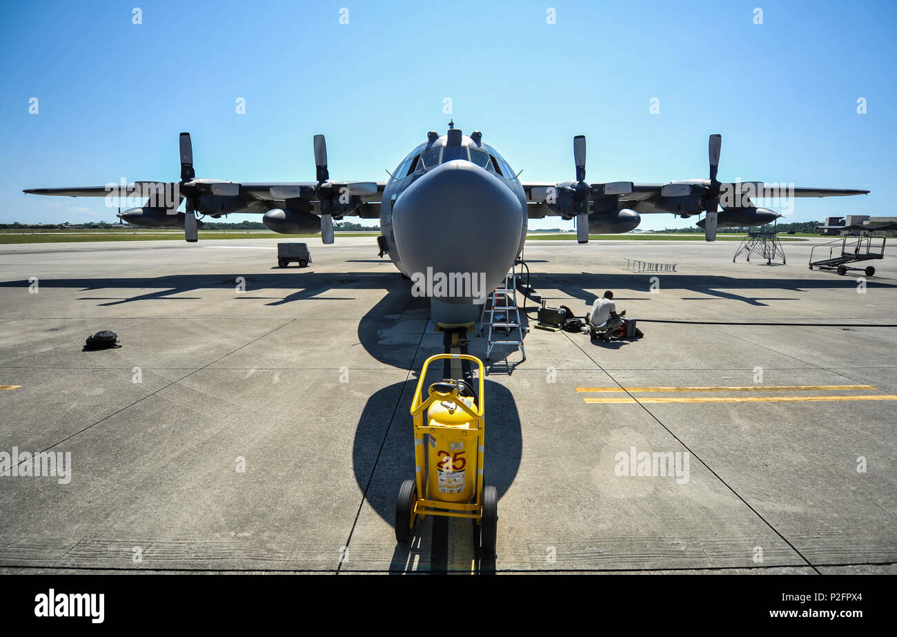 An MC-130H Combat Talon II is prepared for routine maintenance on the ...