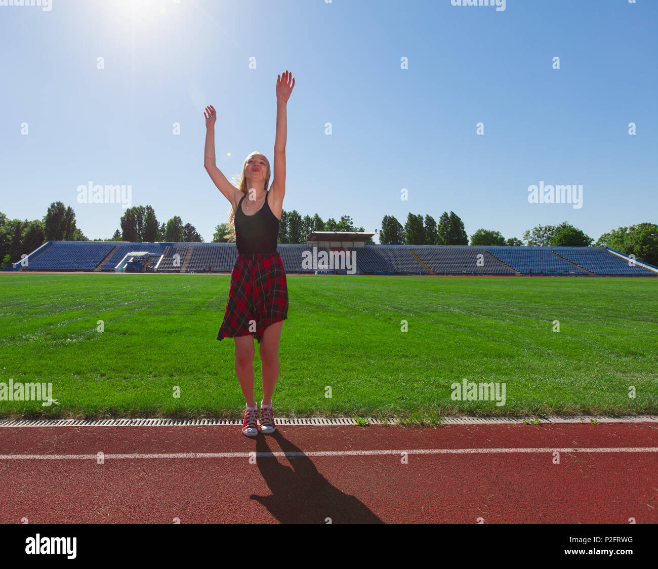 teenage girls doing sports at the stadium Stock Photo - Alamy