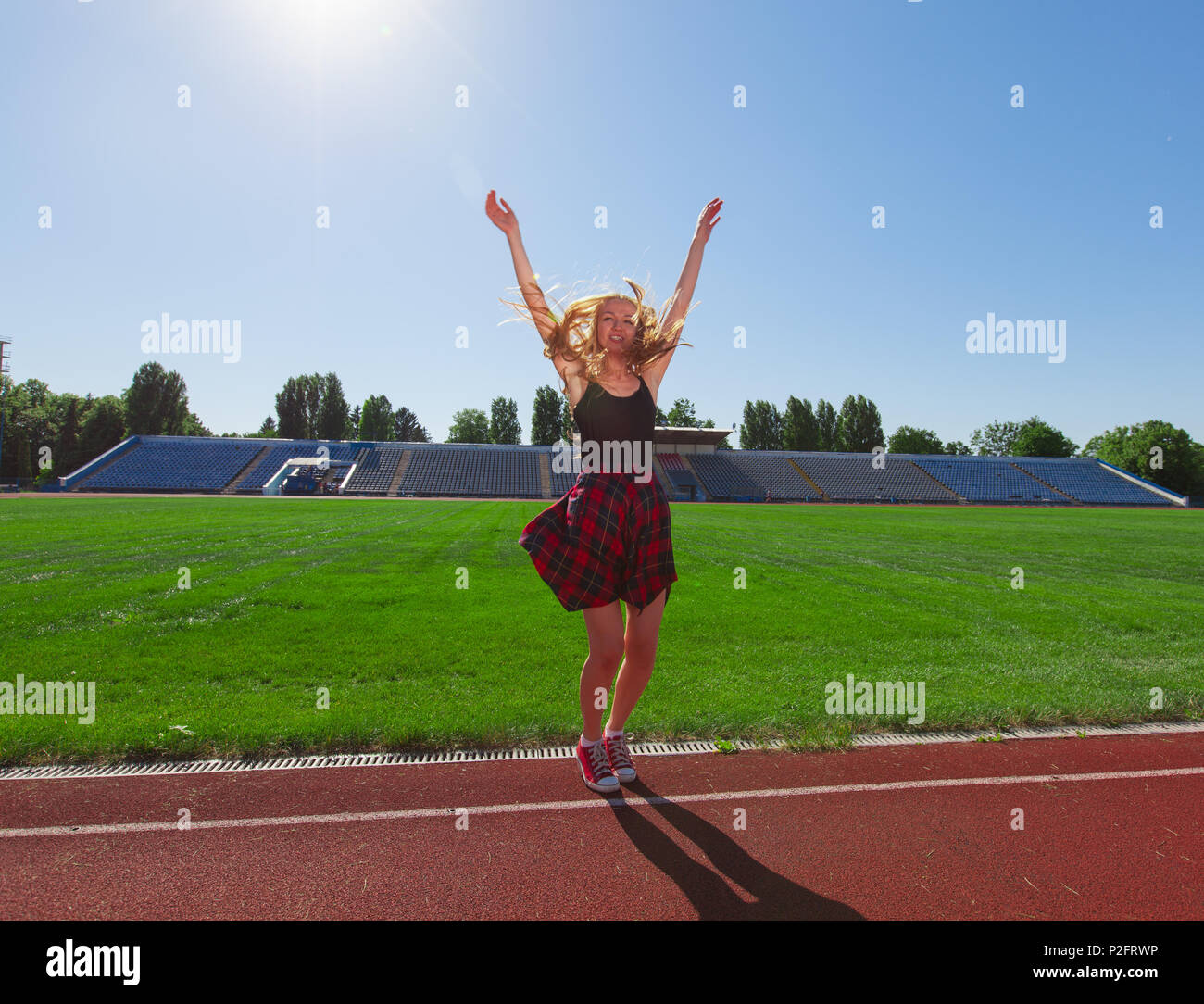 teenage girls doing sports at the stadium Stock Photo - Alamy