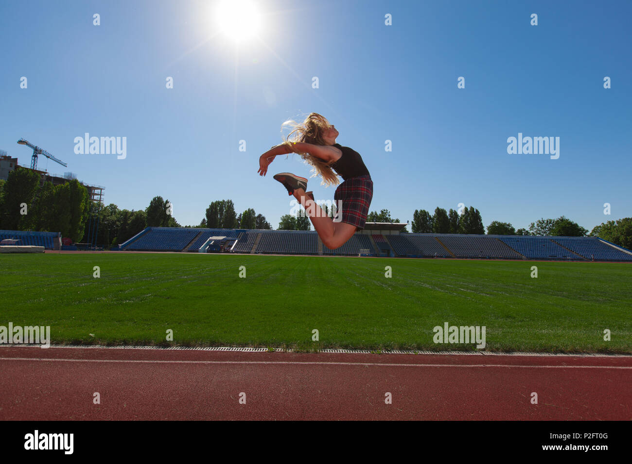 teenage girls doing sports at the stadium Stock Photo - Alamy