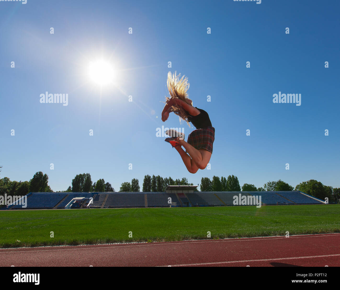 teenage girls doing sports at the stadium Stock Photo - Alamy