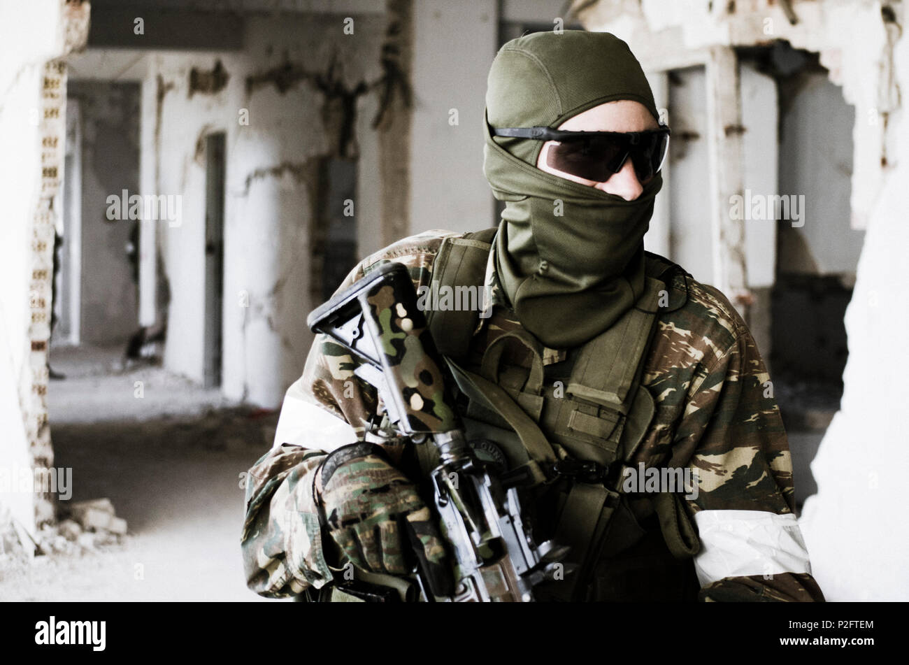 Assault rifle on male hi-res stock photography and images - Alamy