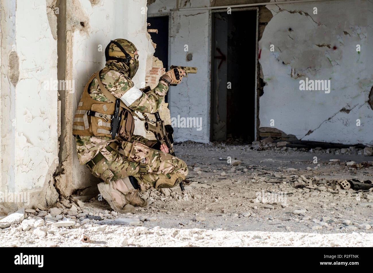 Army soldier holding pistol military military uniform hi-res stock ...