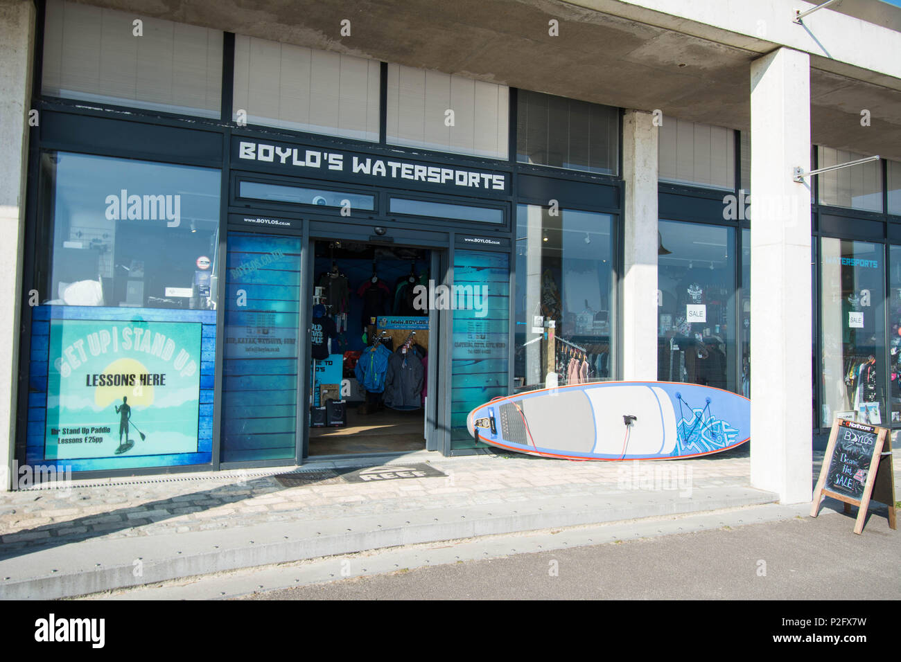 Lyme Regis water sport boat sailing shop lessons front entrance open ...