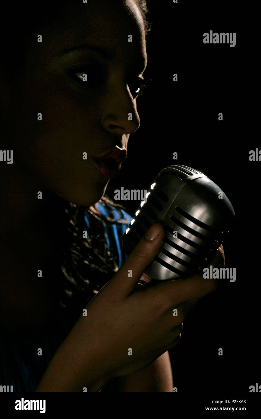 Retro microphone and hands hi-res stock photography and images - Alamy