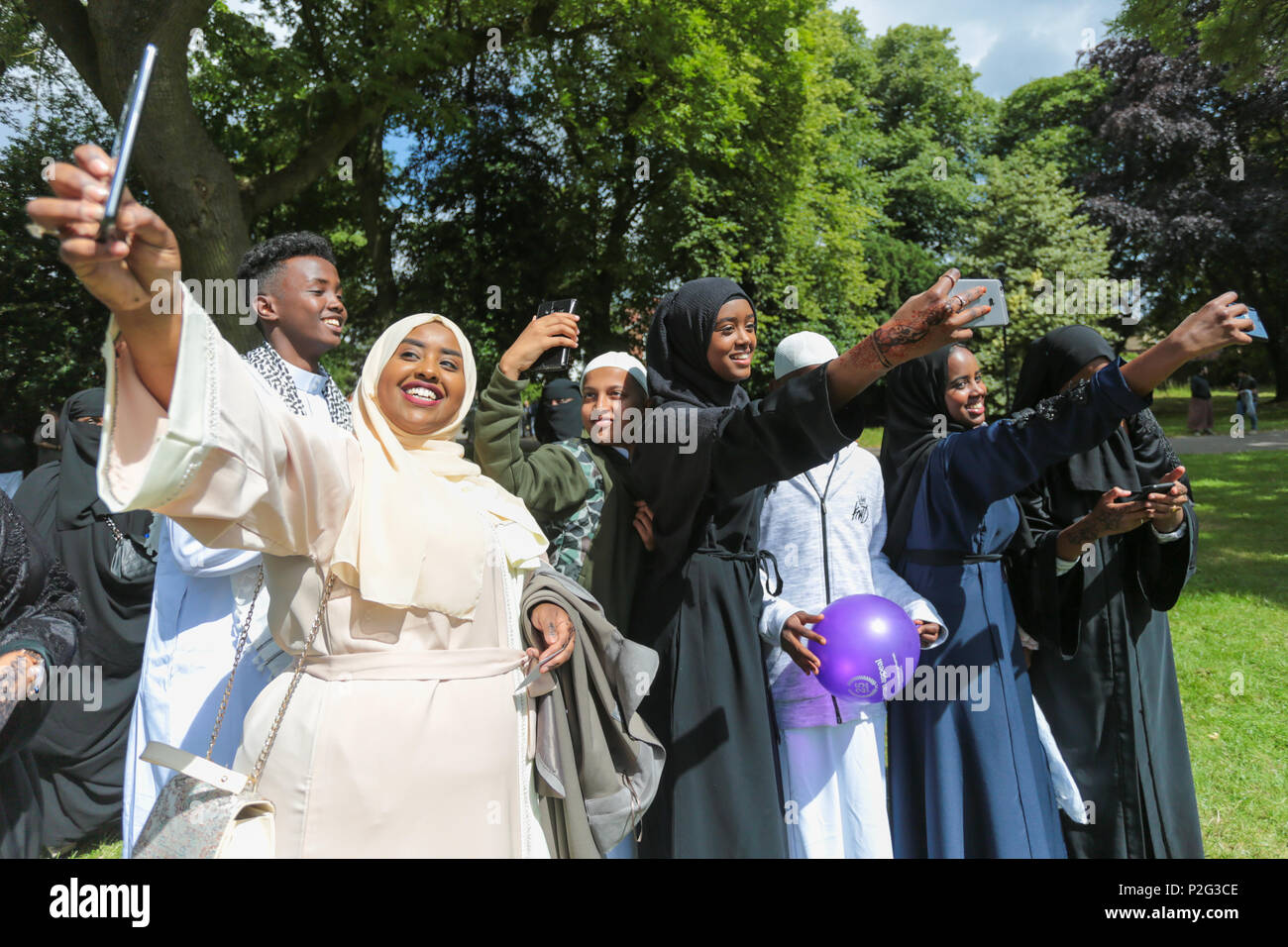 A group of young asian British people in Small Heath park, Birmingham ...
