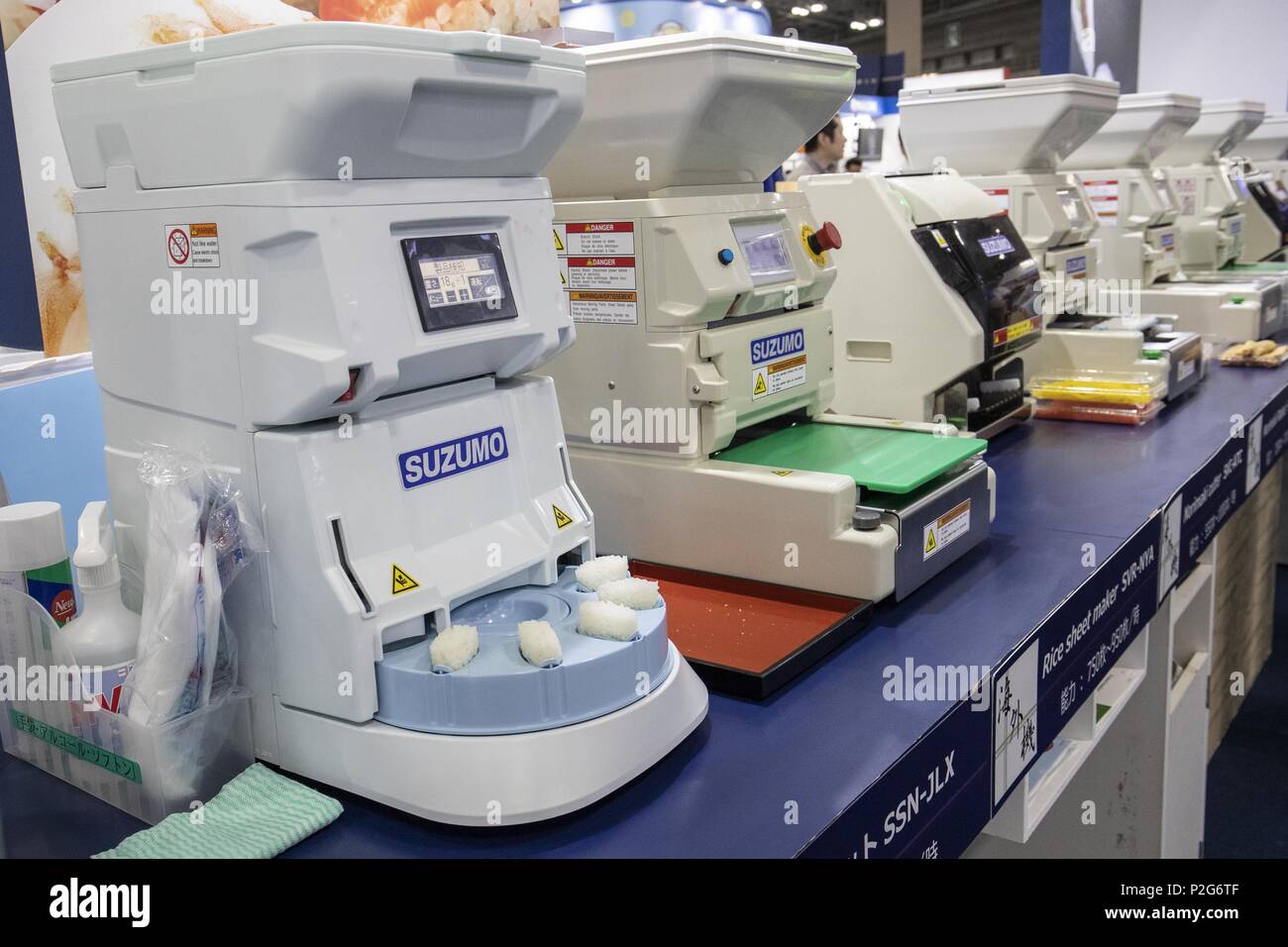 Tokyo, Japan. 15th June, 2018. Sushi-making machines produced by Suzumo ...