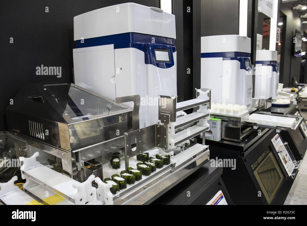 Tokyo, Japan. 15th June, 2018. Sushi-making machines produced by Suzumo ...