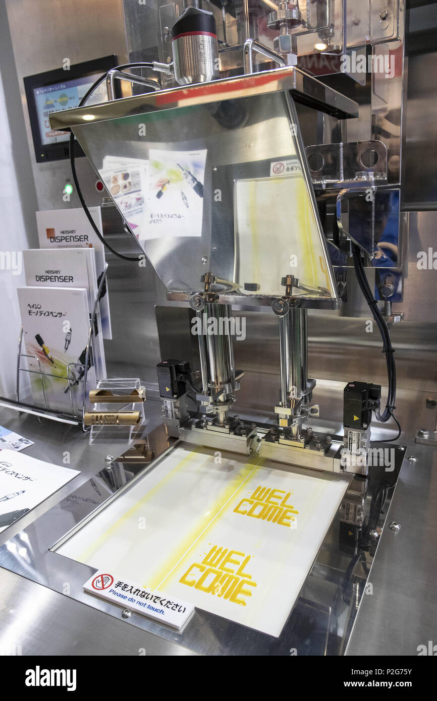 Tokyo, Japan. 15th June, 2018. Food processing machinery on display ...