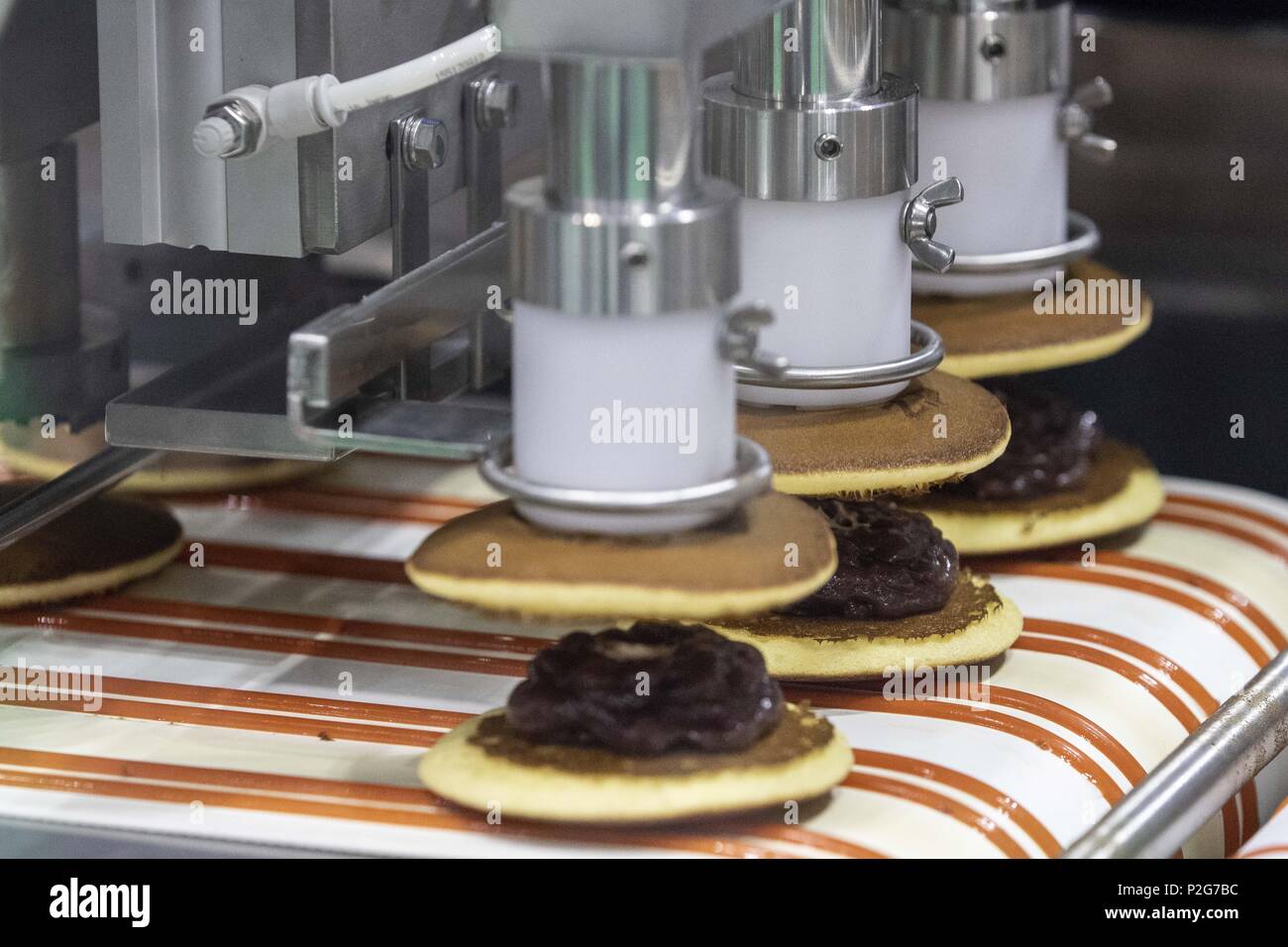 Tokyo, Japan. 15th June, 2018. Food processing machinery on display ...