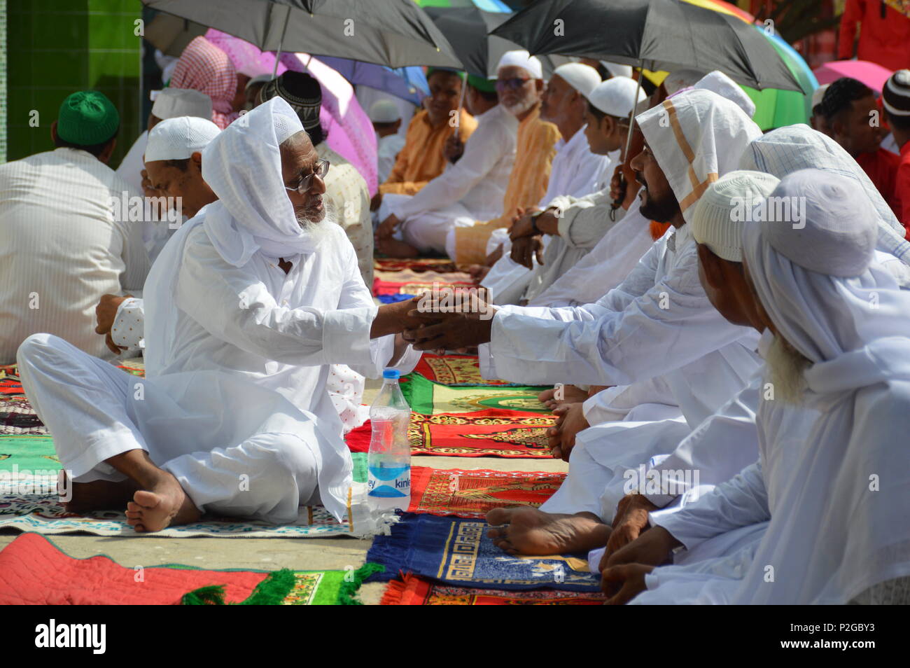 Offering prayers during eid hi-res stock photography and images - Alamy