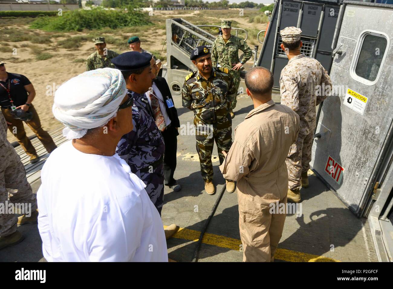 Officials with the Royal Omani Police tour a U.S. Navy Landing Craft ...