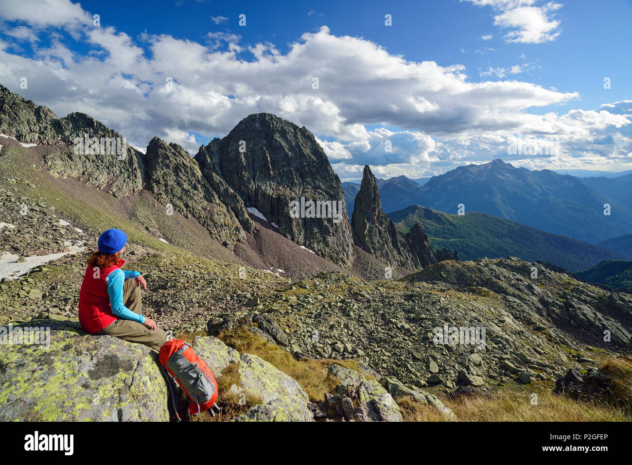 Woman looking towards ridge with Campanile di Cece and Cima d'Asta ...