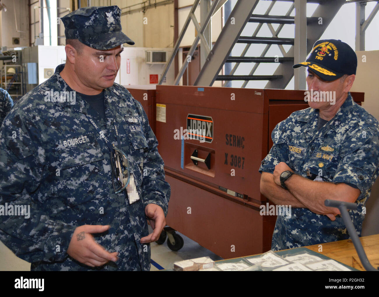 Fire Controllman 1st Class Geoffrey Bourget shows Rear Adm. Roy ...