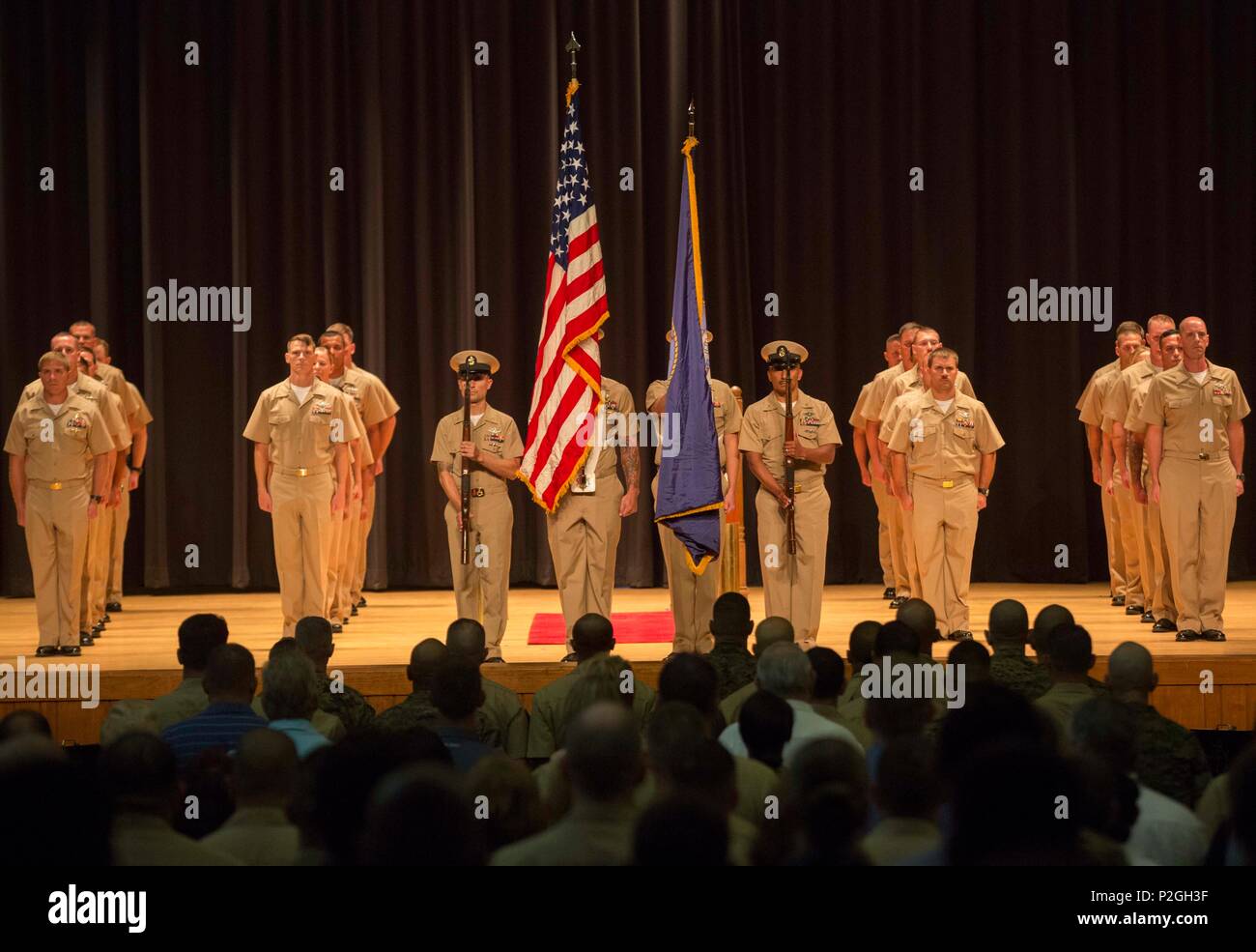 The Naval Color Guard presents the colors in front of the newest ...