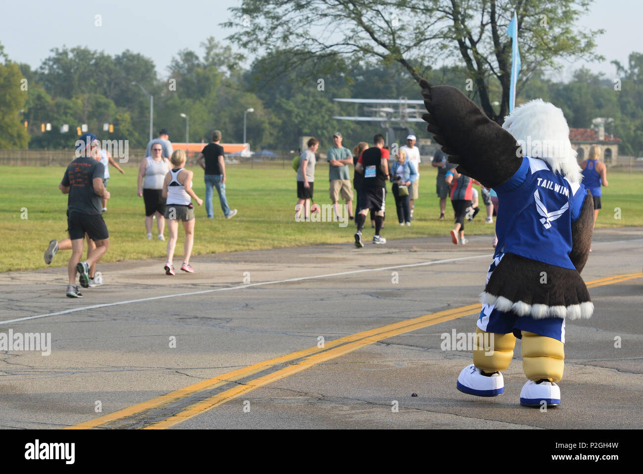 Tailwind, official mascot for the Air Force Marathon, cheers on runners ...
