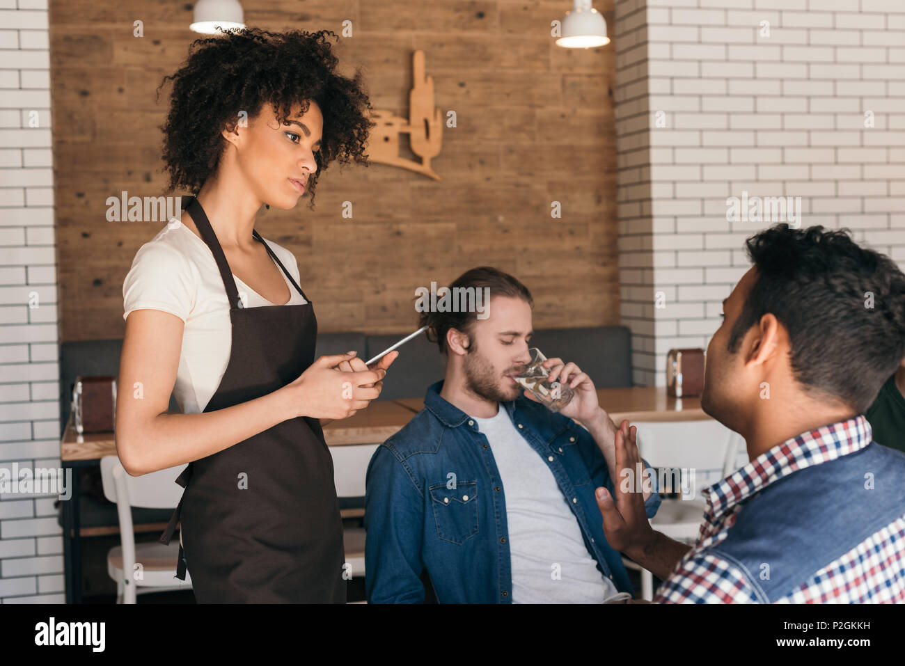 African american waitress customers hi-res stock photography and images ...