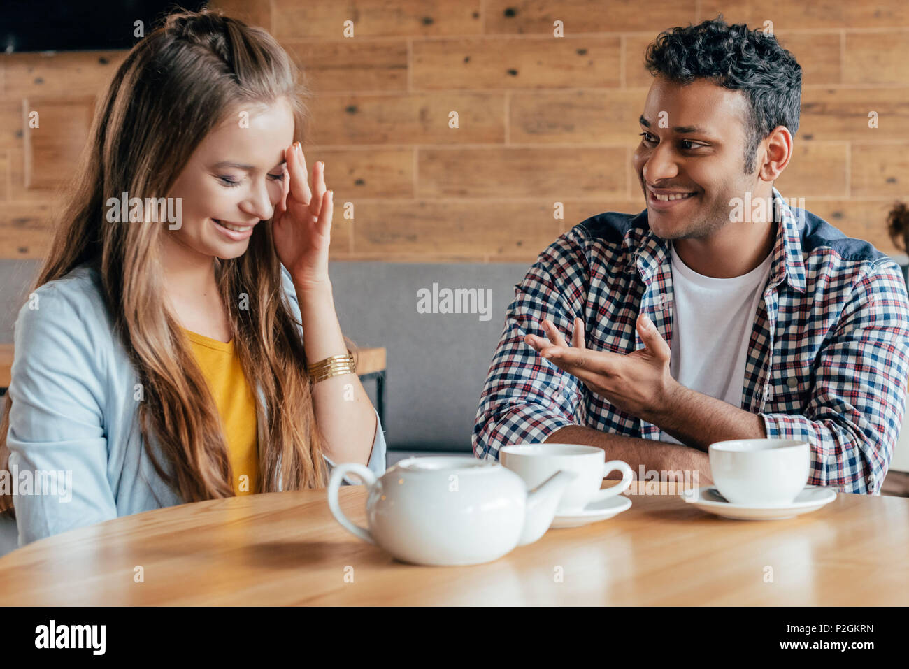 Talking shy hi-res stock photography and images - Alamy