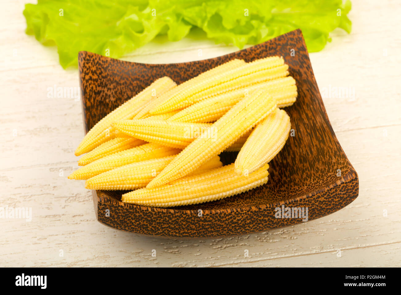 Young raw baby corn Stock Photo - Alamy